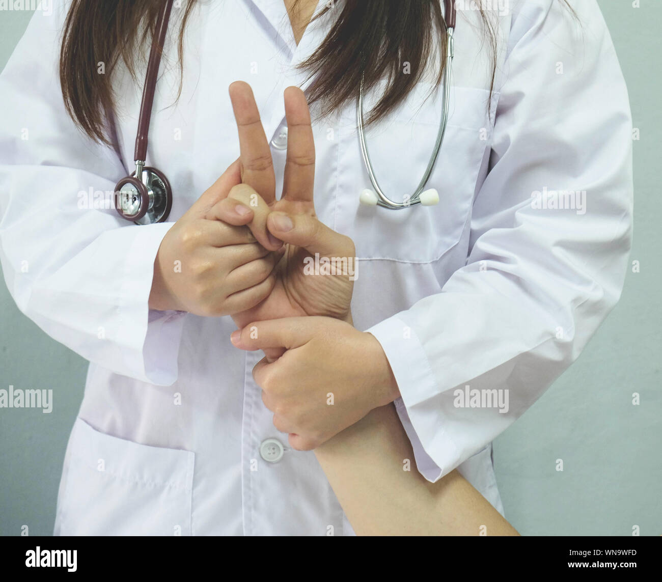 Doctor hand holding patient hand hi-res stock photography and images ...