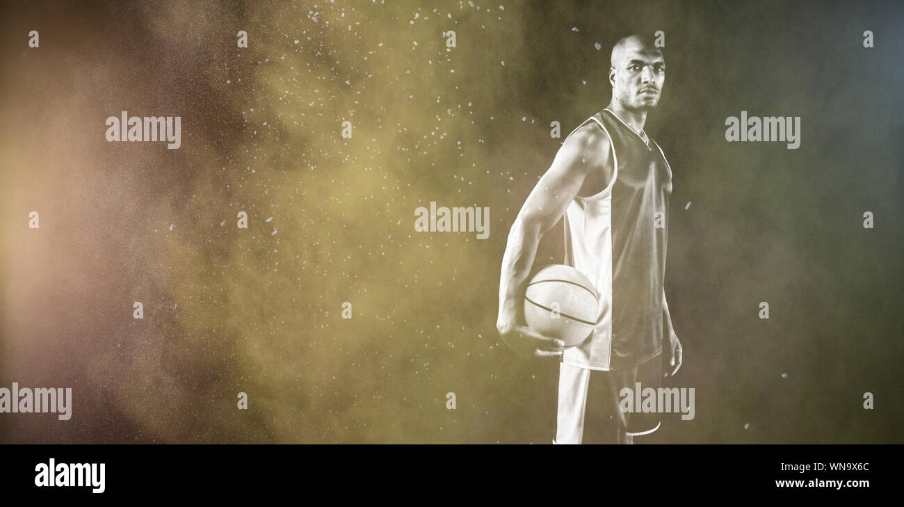 Composite image of basketball player Stock Photo - Alamy