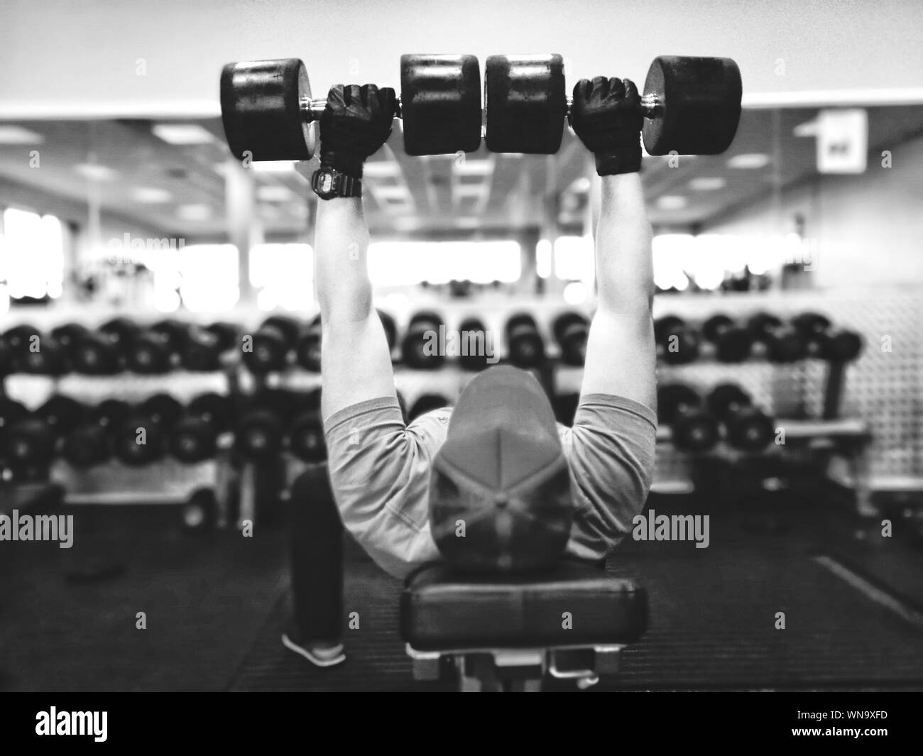Lifting one arm hi-res stock photography and images - Alamy
