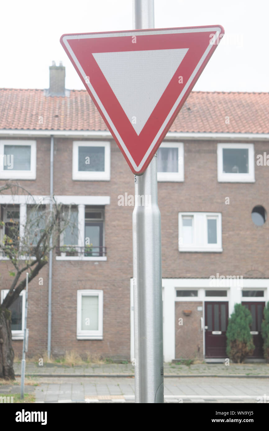 Empty triangular road sign hi-res stock photography and images - Alamy