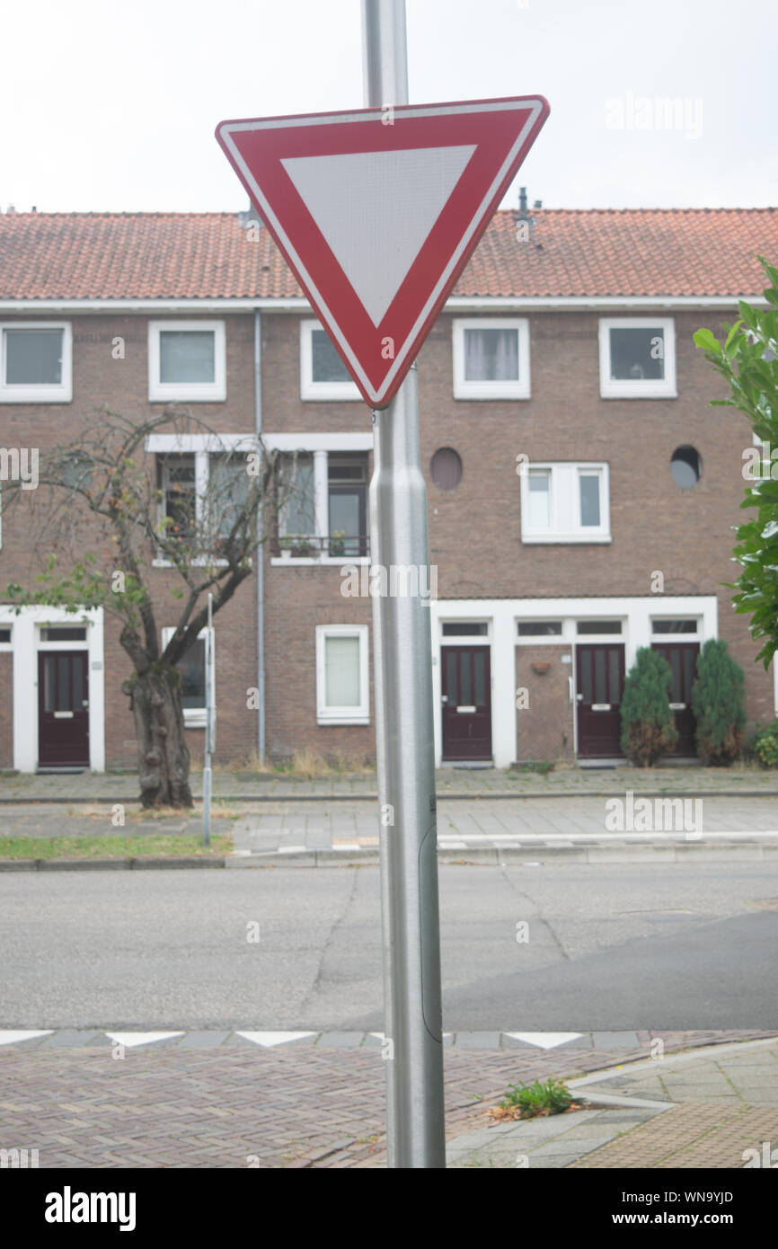 Dutch road sign: give priority to traffic on the main road ahead Stock ...