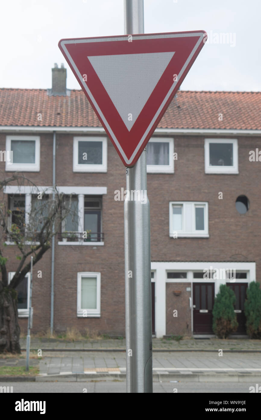 Dutch road sign: give priority to traffic on the main road ahead Stock ...