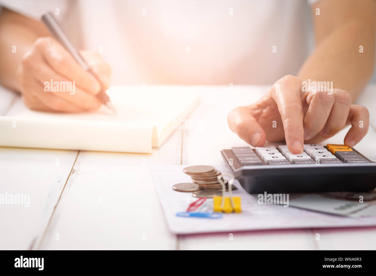 Person and calculating hi-res stock photography and images - Alamy