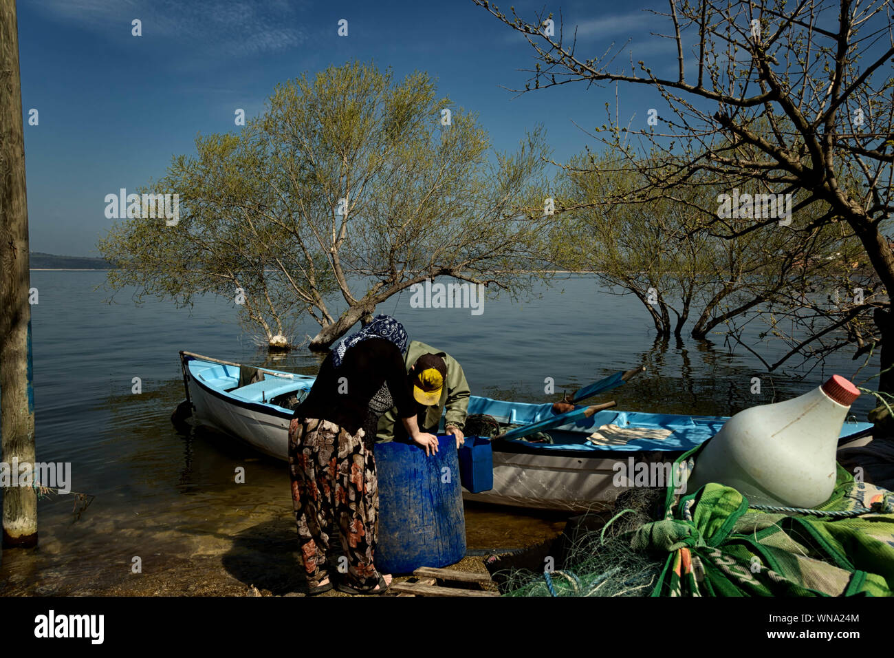 Container boat people hi-res stock photography and images - Alamy