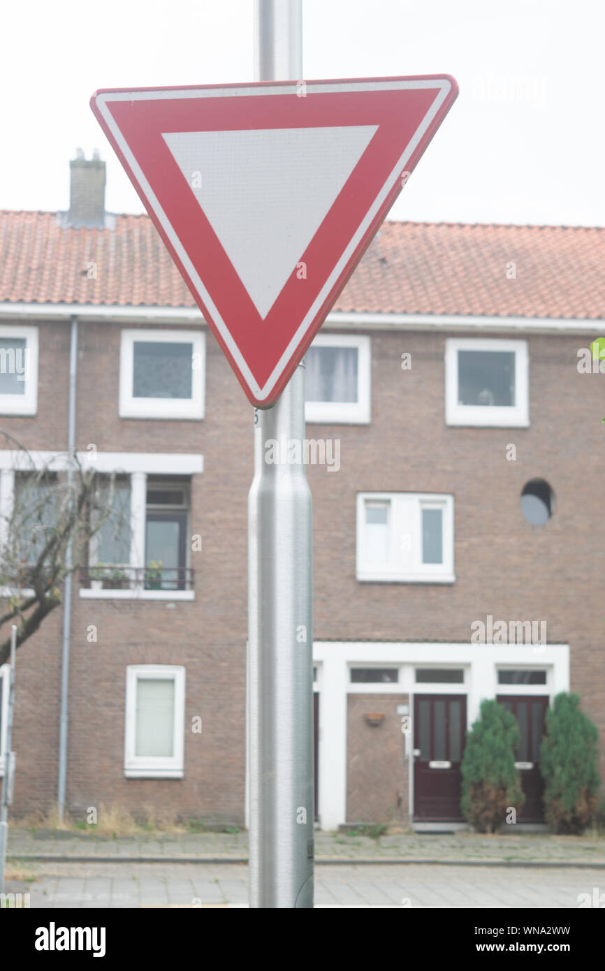 Dutch road sign: give priority to traffic on the main road ahead Stock ...