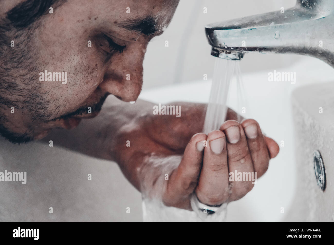 Man Washing Hands High Resolution Stock Photography and Images - Alamy