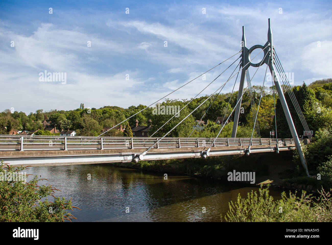 Suspension-style road bridge crossing the river Severn at Jackfield ...