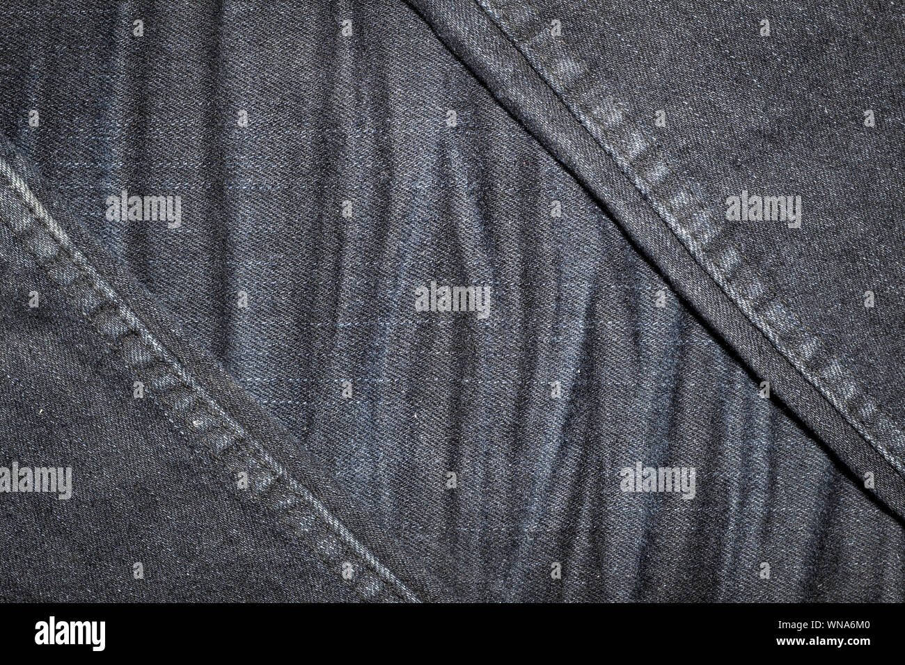 Background texture of old jeans with a pattern of wrinkles Stock Photo ...