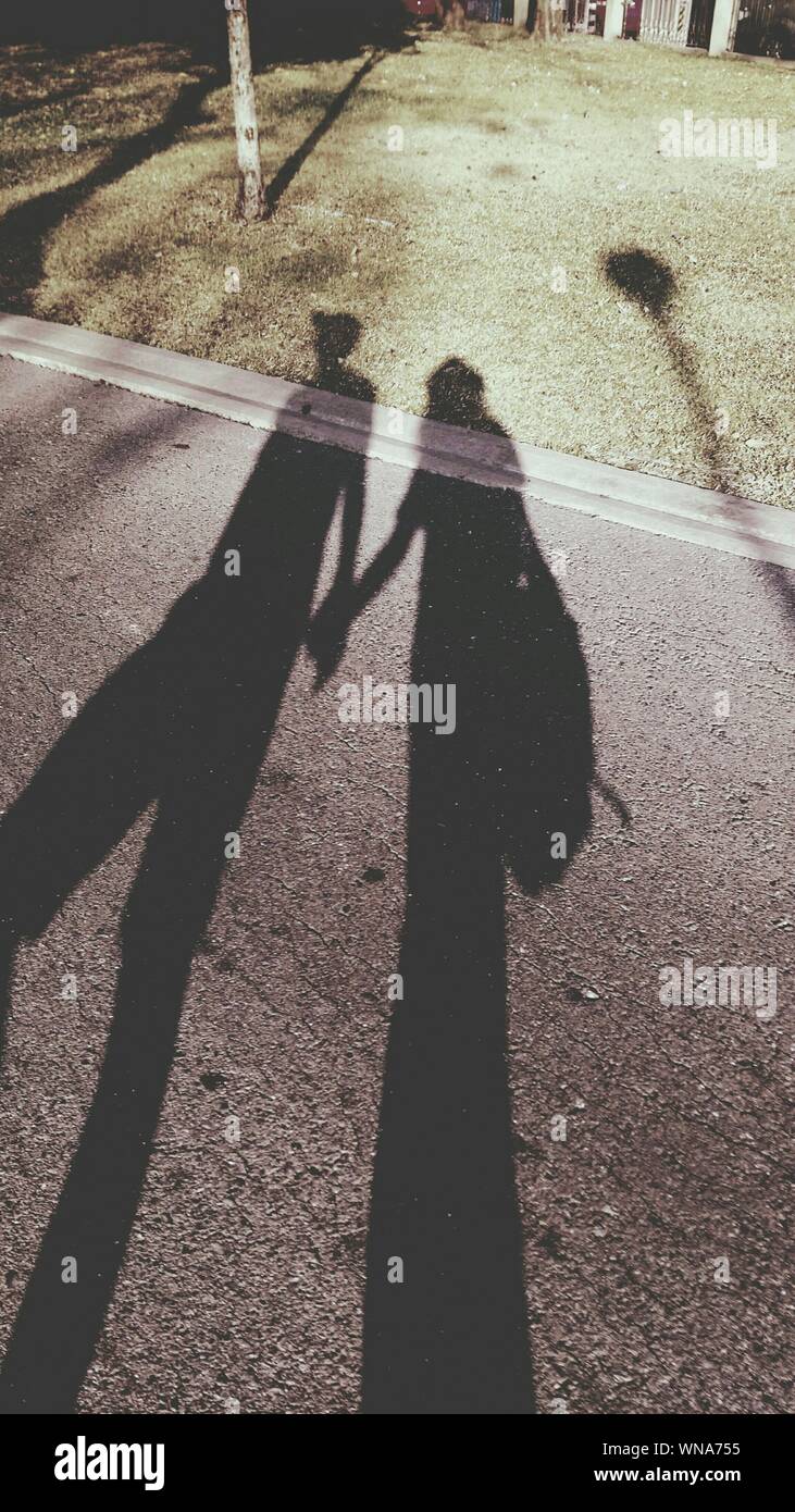 Shadow Of People On Street Stock Photo - Alamy