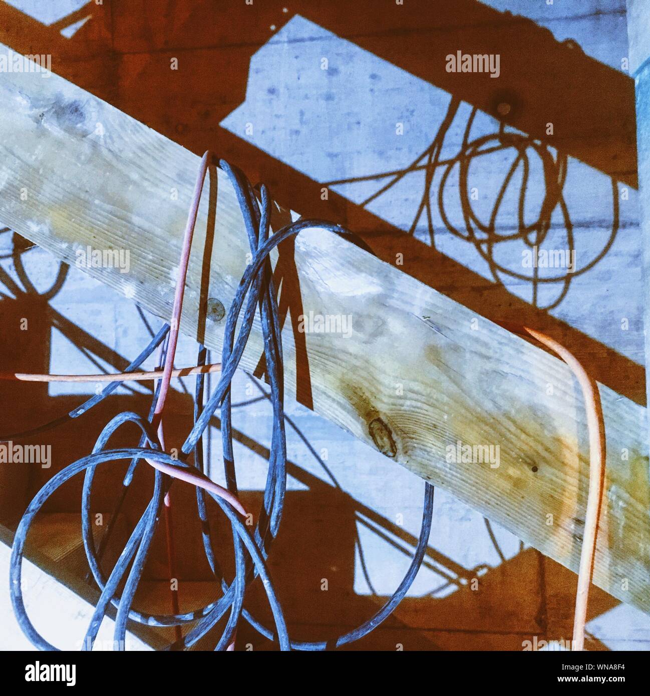 Hanging by wires hi-res stock photography and images - Alamy