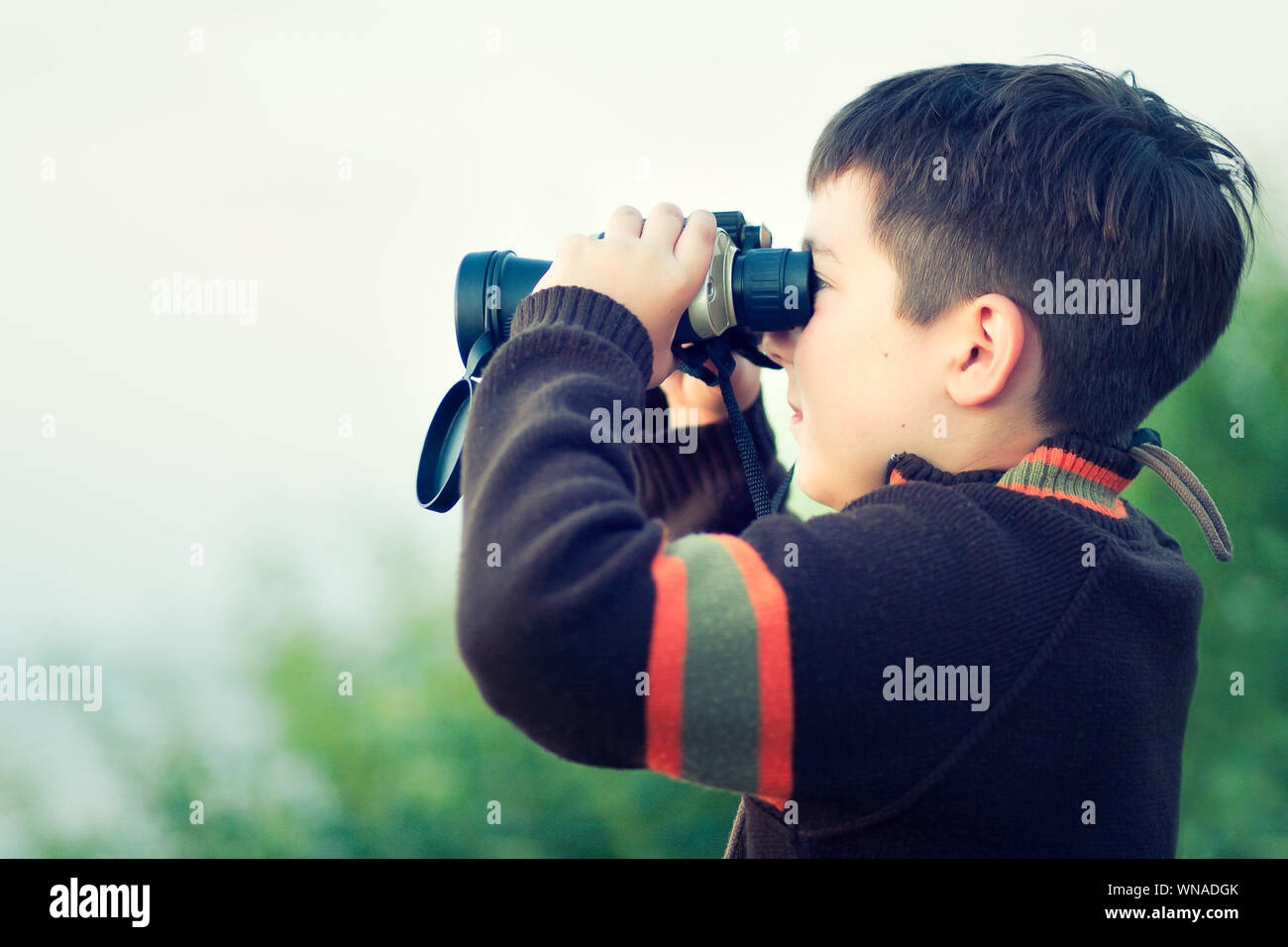 Children with binoculars hi-res stock photography and images - Alamy