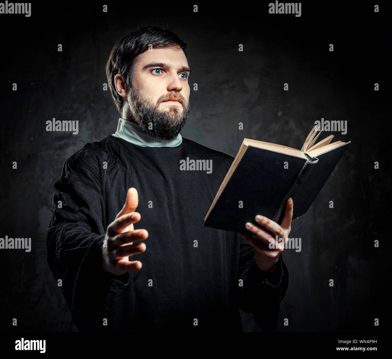 Religious person holding bible hi-res stock photography and images - Alamy