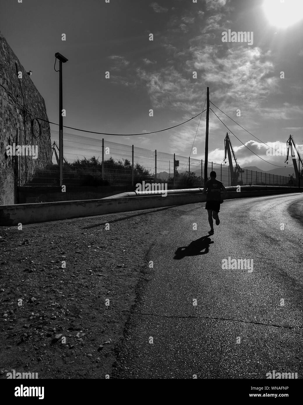 Shadow man running on street hi-res stock photography and images - Alamy