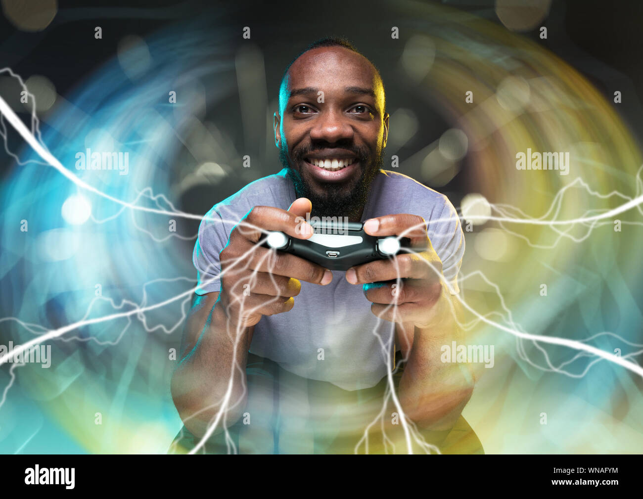 Full immersion in gameplay. Young man holding a video game controller ...