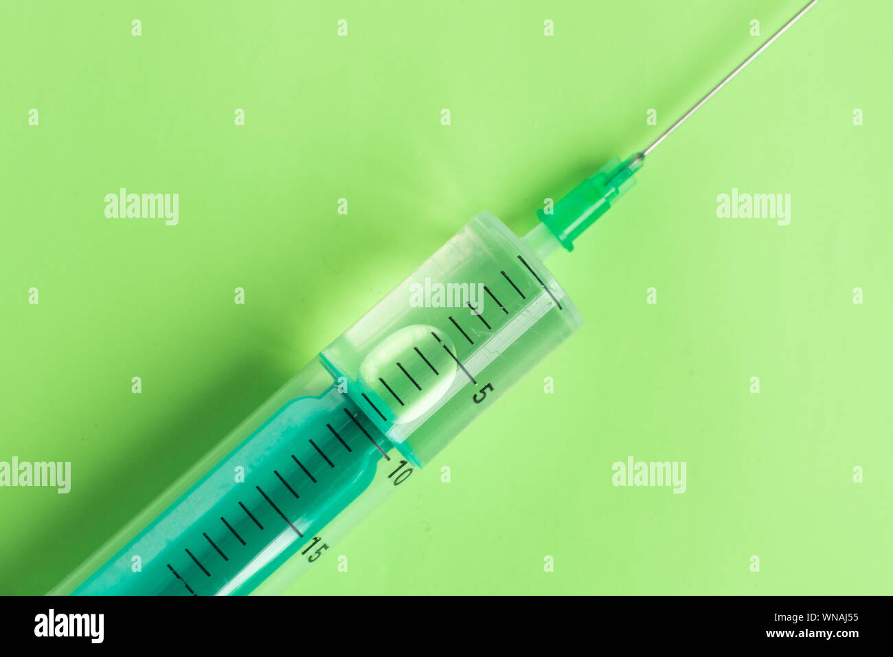 Syringe with injection closeup. Medicine treatment concept Stock Photo ...