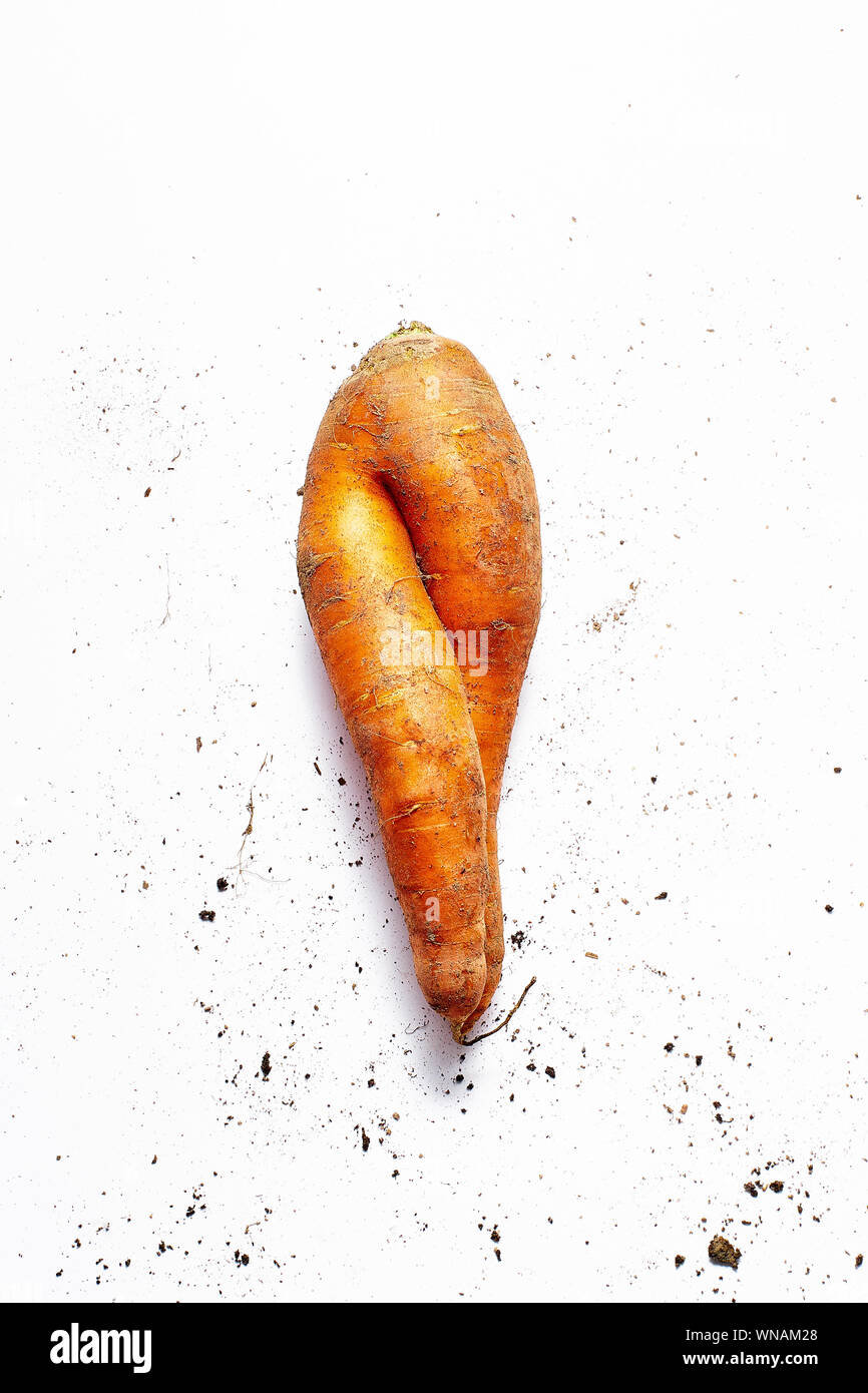 Organic carrot of unusual shape Stock Photo - Alamy