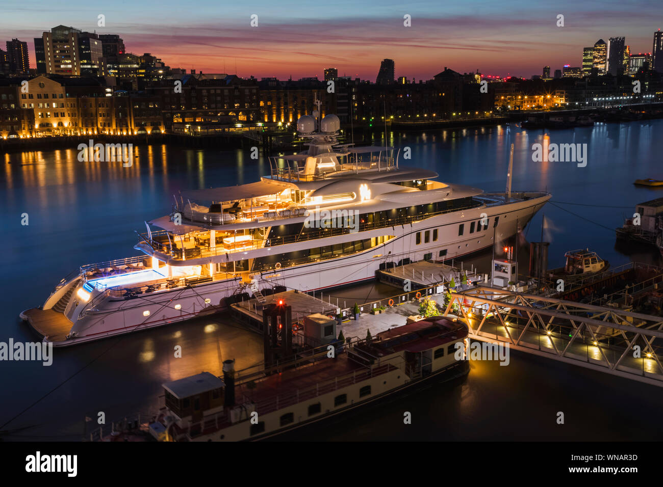 England, London, Luxury Motor Yacht at Anchor on River Thames with ...