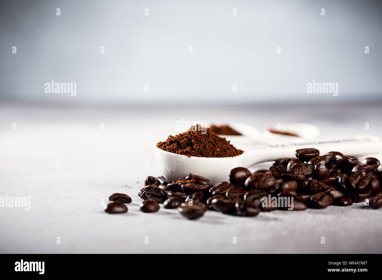 Coffee beans on gray background Stock Photo - Alamy