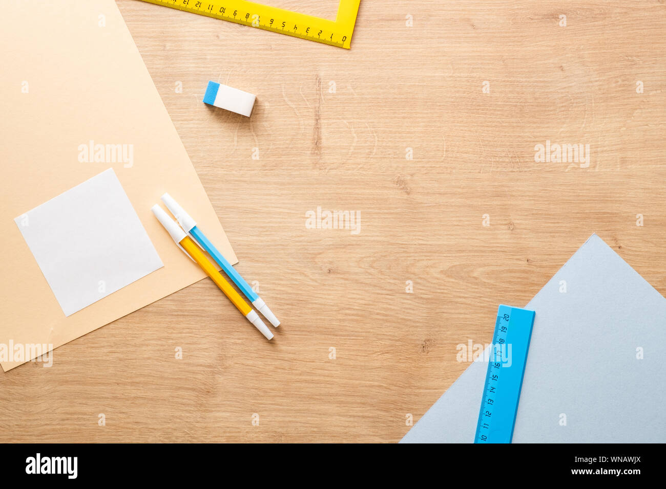 Modern school supplies on wooden desk table background. Back to school ...