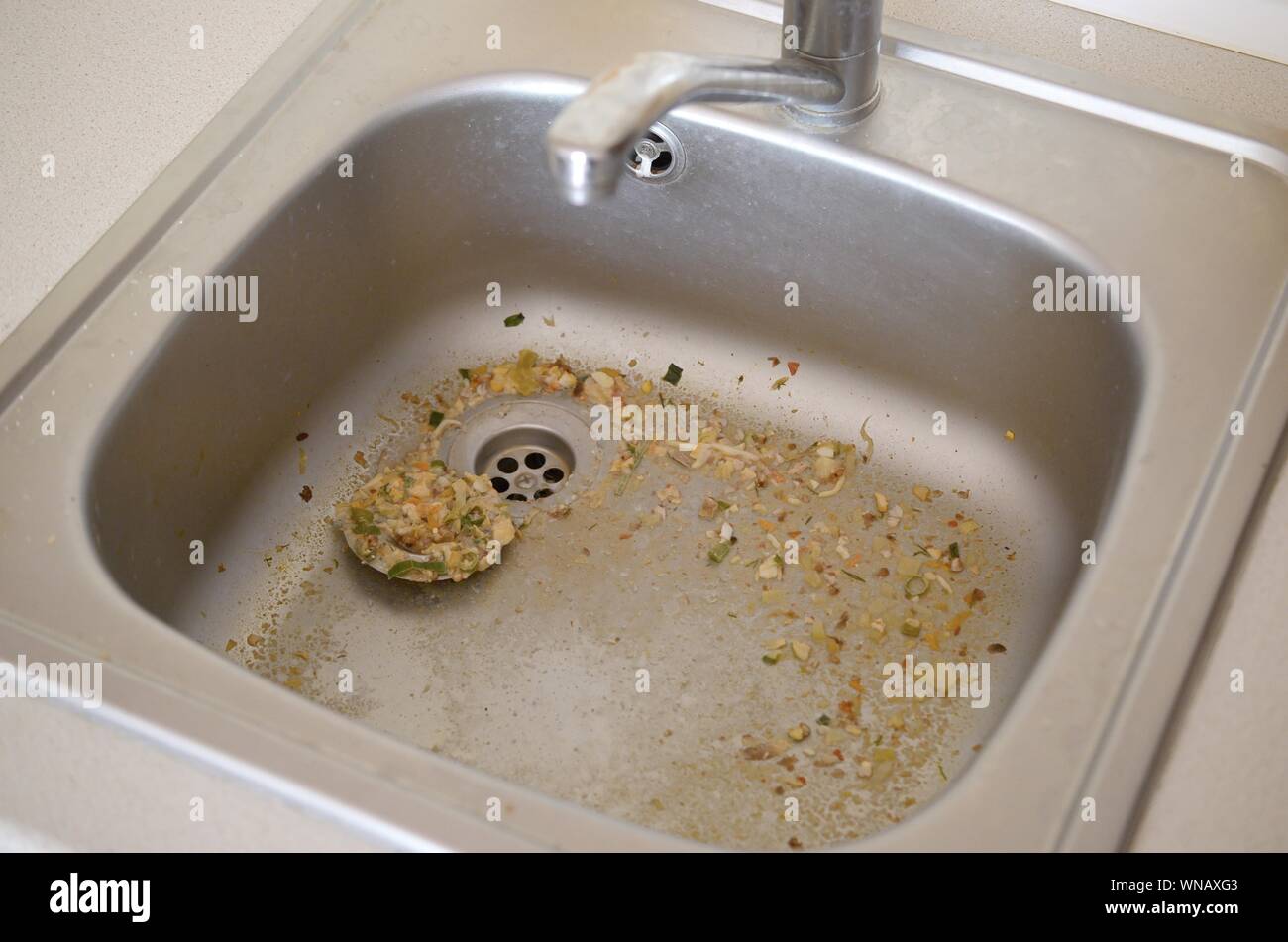 Clogging kitchen sink hi-res stock photography and images - Alamy