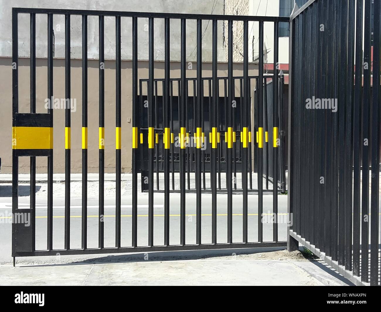 Open black metal gate hi-res stock photography and images - Alamy