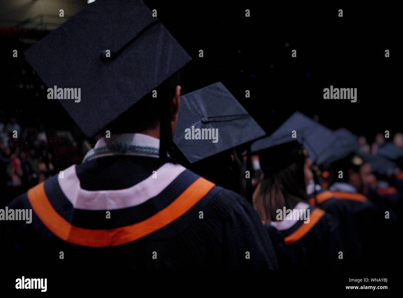 Orange graduation hi-res stock photography and images - Alamy