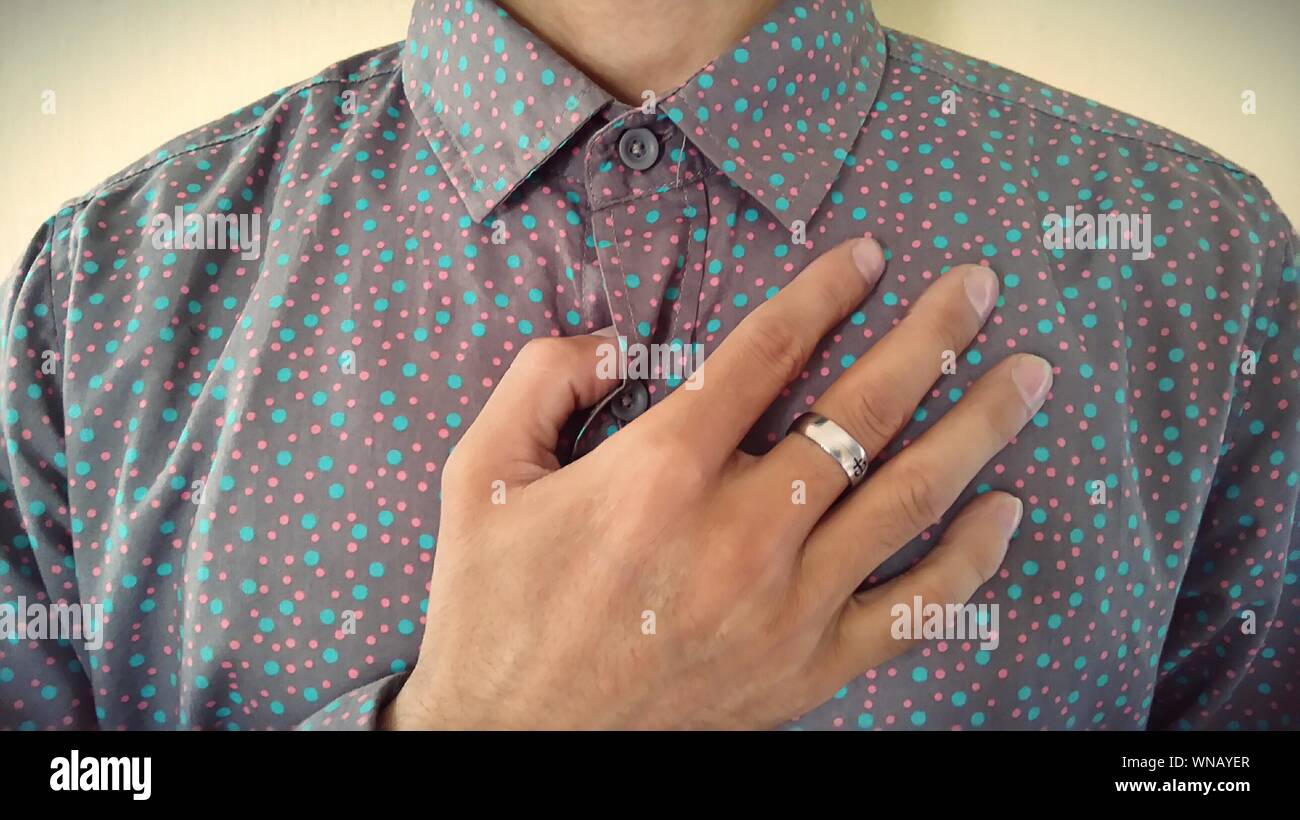 Man holding chest chest hi-res stock photography and images - Alamy