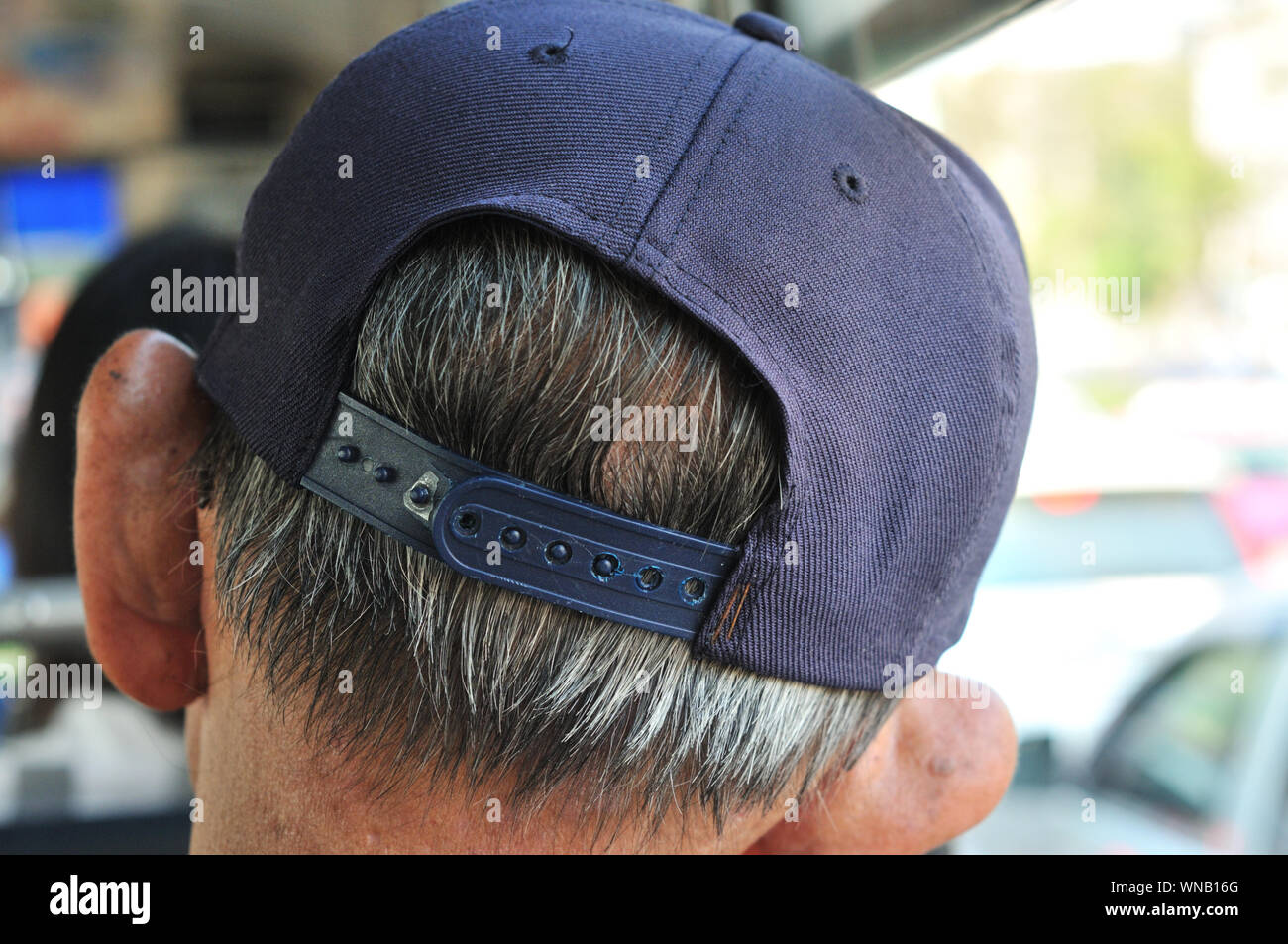 One man wearing baseball cap hi-res stock photography and images - Alamy