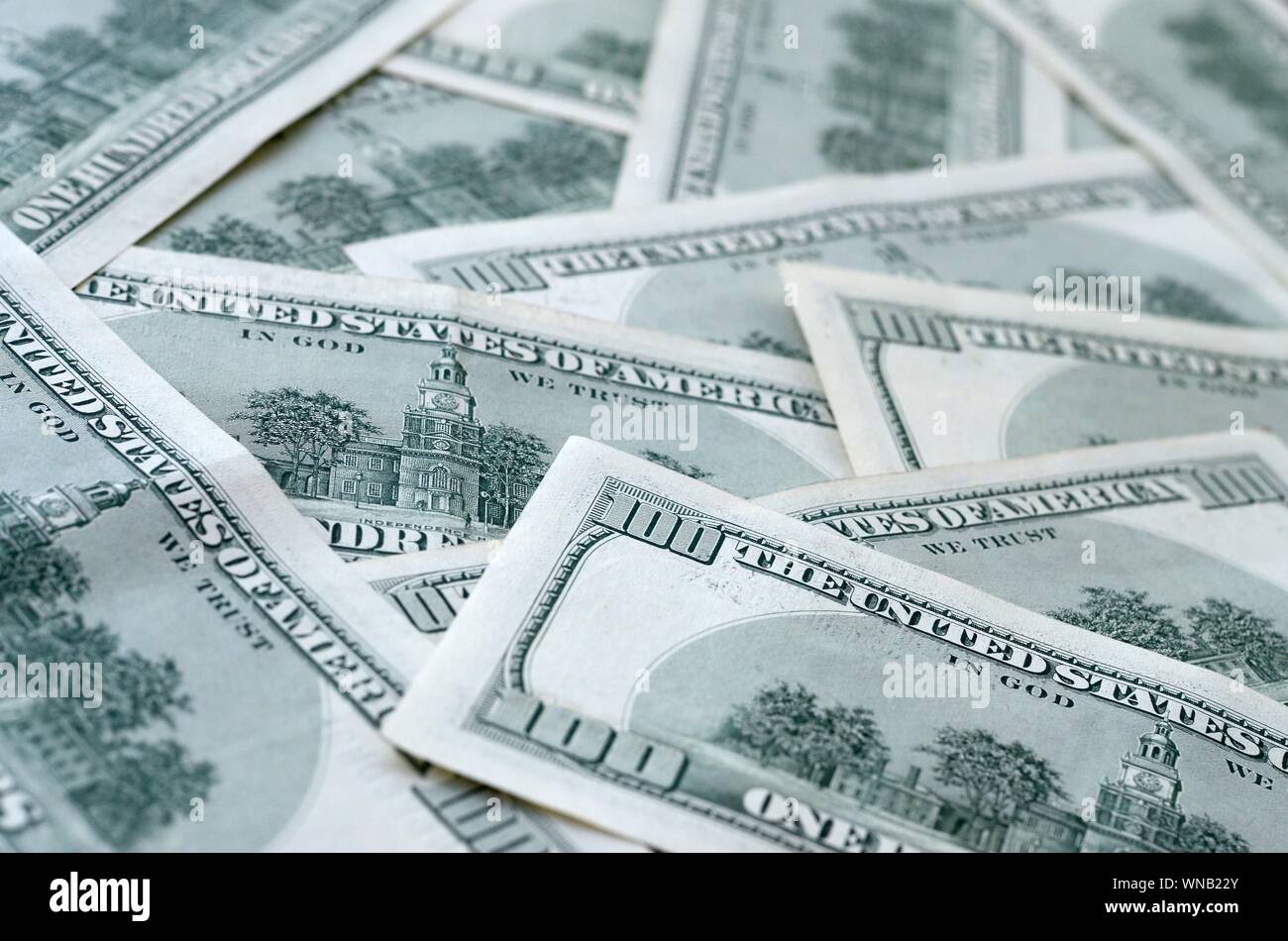 Background of 100 dollar bills. Abstract textured backdrop with many ...