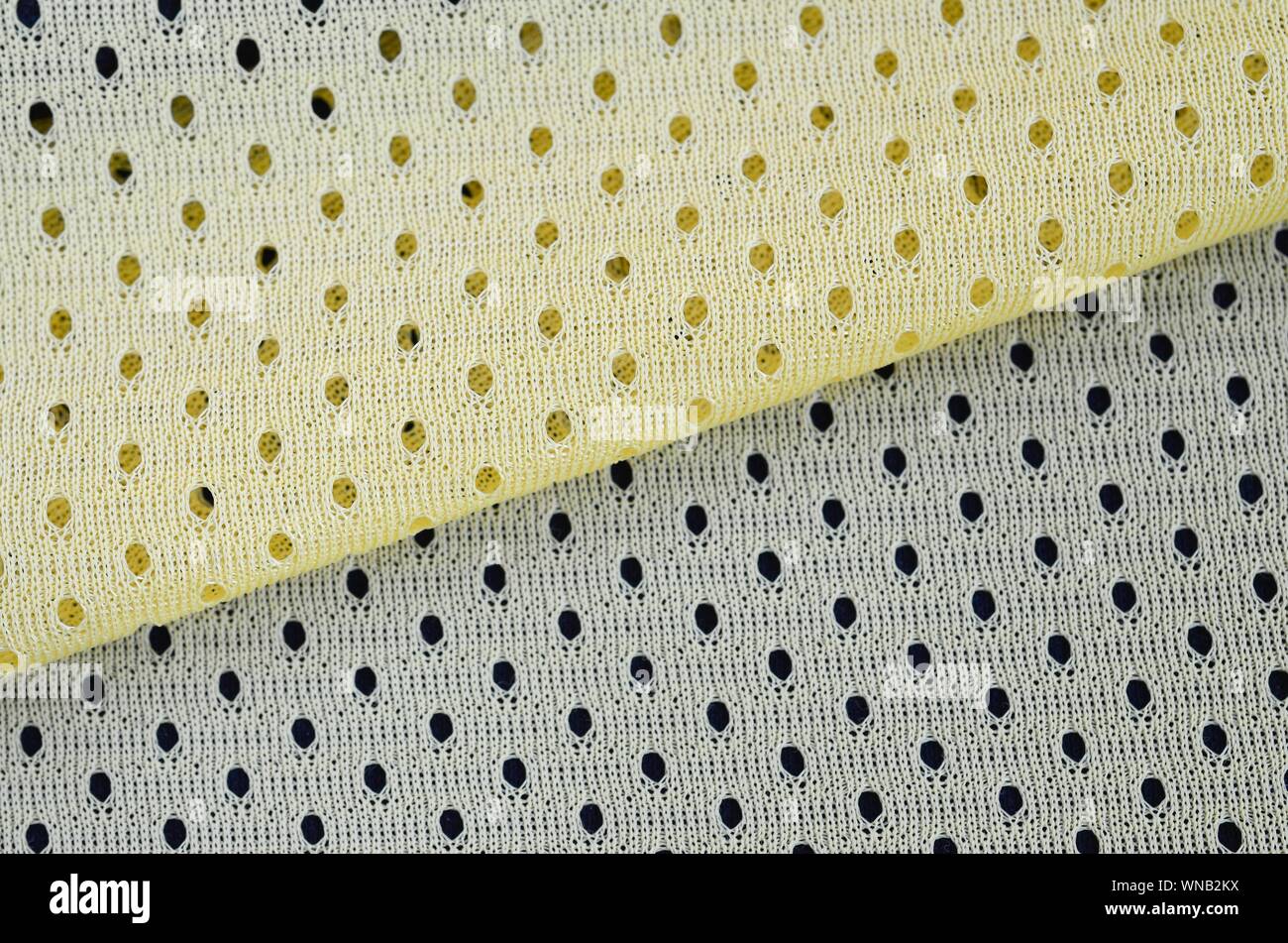 Yellow mesh sport wear fabric textile pattern background. Yellow color ...