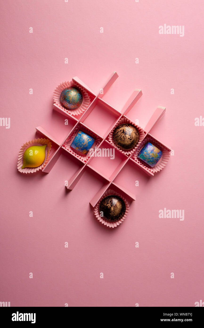 Pink food background with chocolate, food concept Stock Photo - Alamy