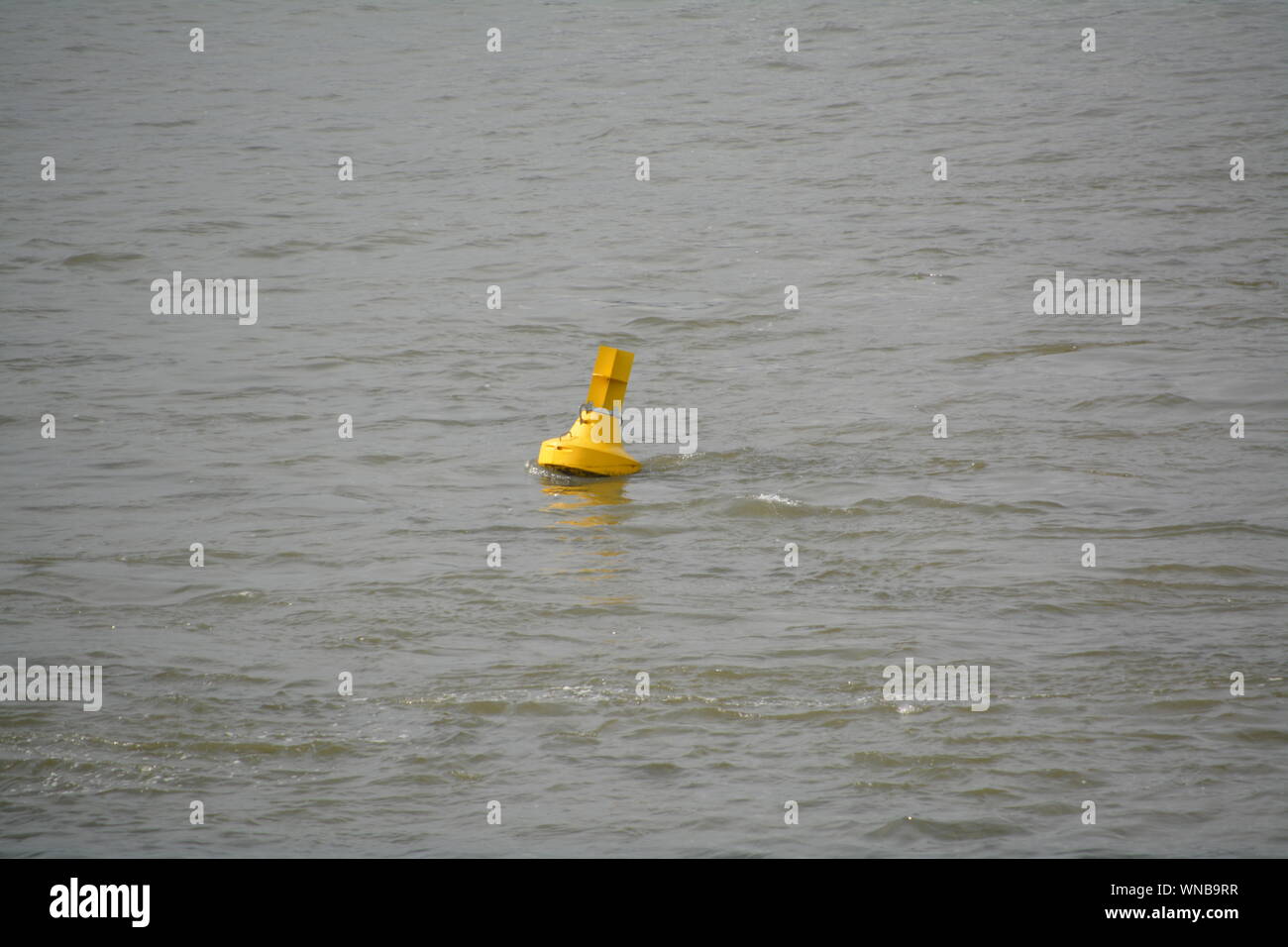 Yellow sea buoy hi-res stock photography and images - Alamy