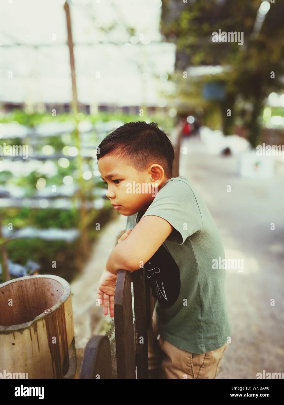 Leaning boy hi-res stock photography and images - Alamy