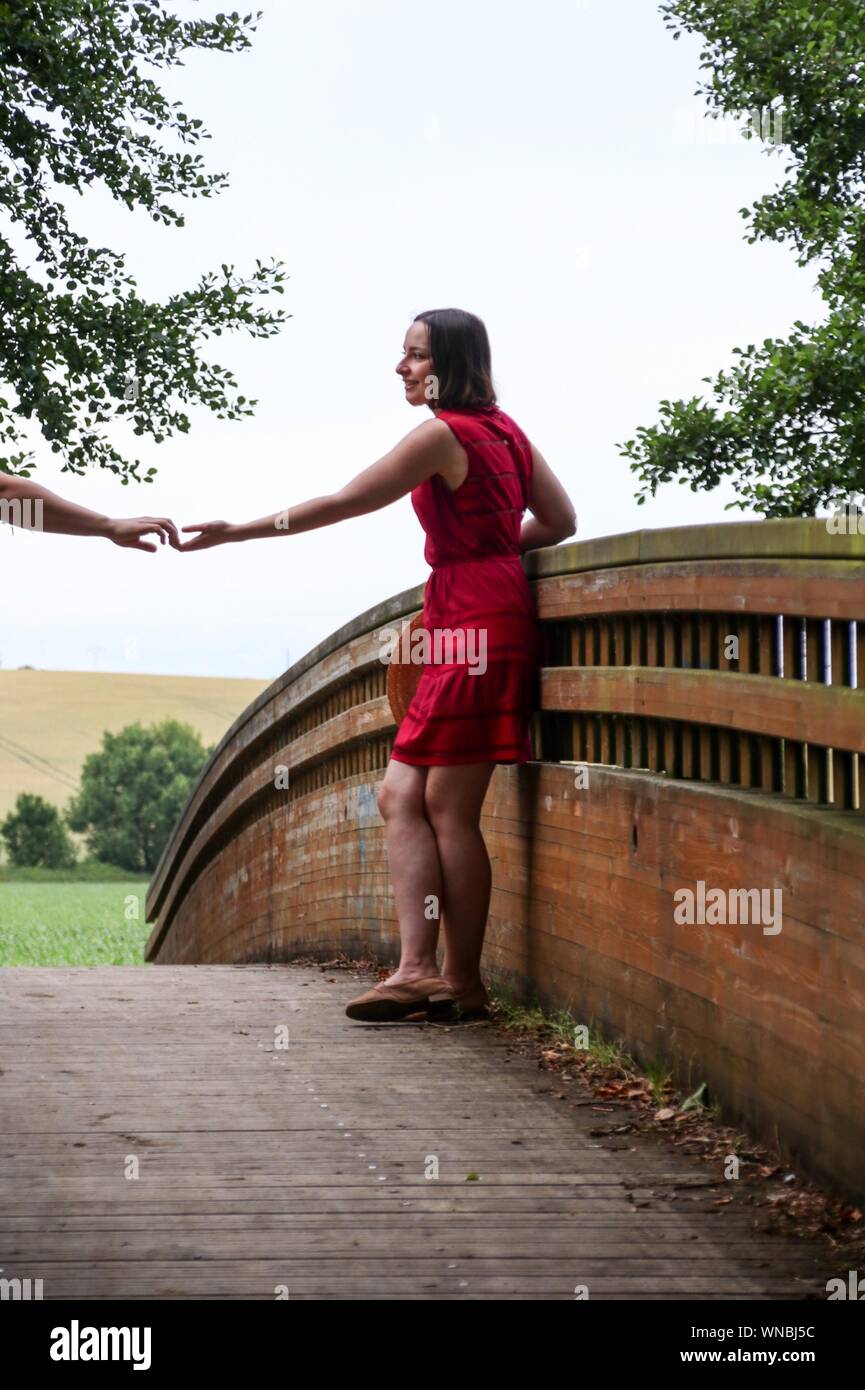 Man reaching full body hi-res stock photography and images - Alamy
