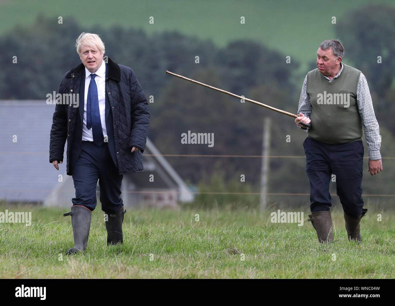 Prime Minister Boris Johnson (left) with with Farmer Peter Watson ...