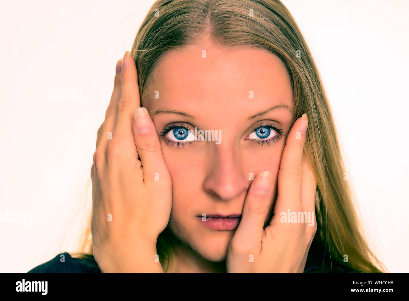 Woman touching face one person hi-res stock photography and images - Alamy