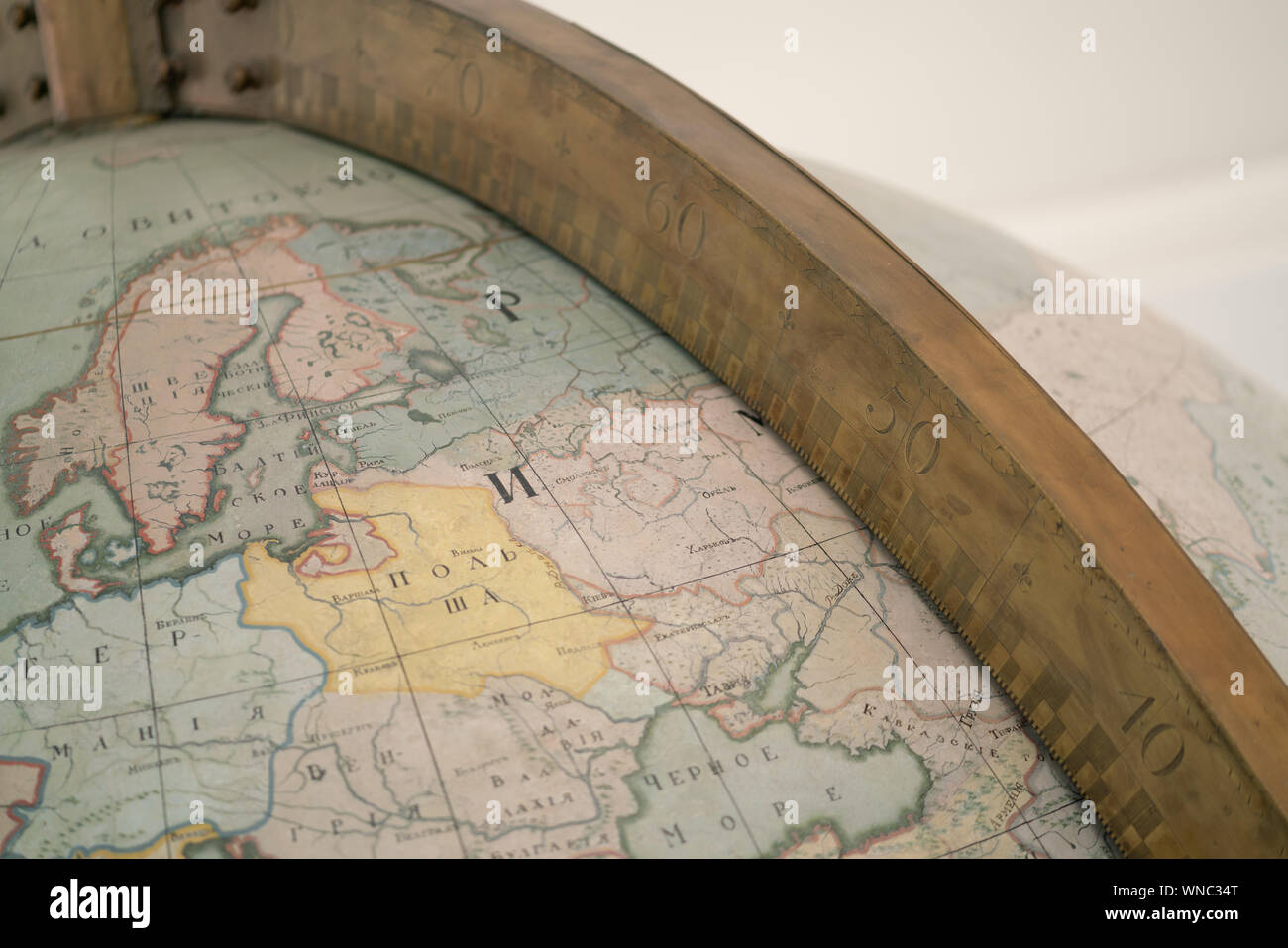 Studio close up of big round world retro globe with scale Stock Photo ...