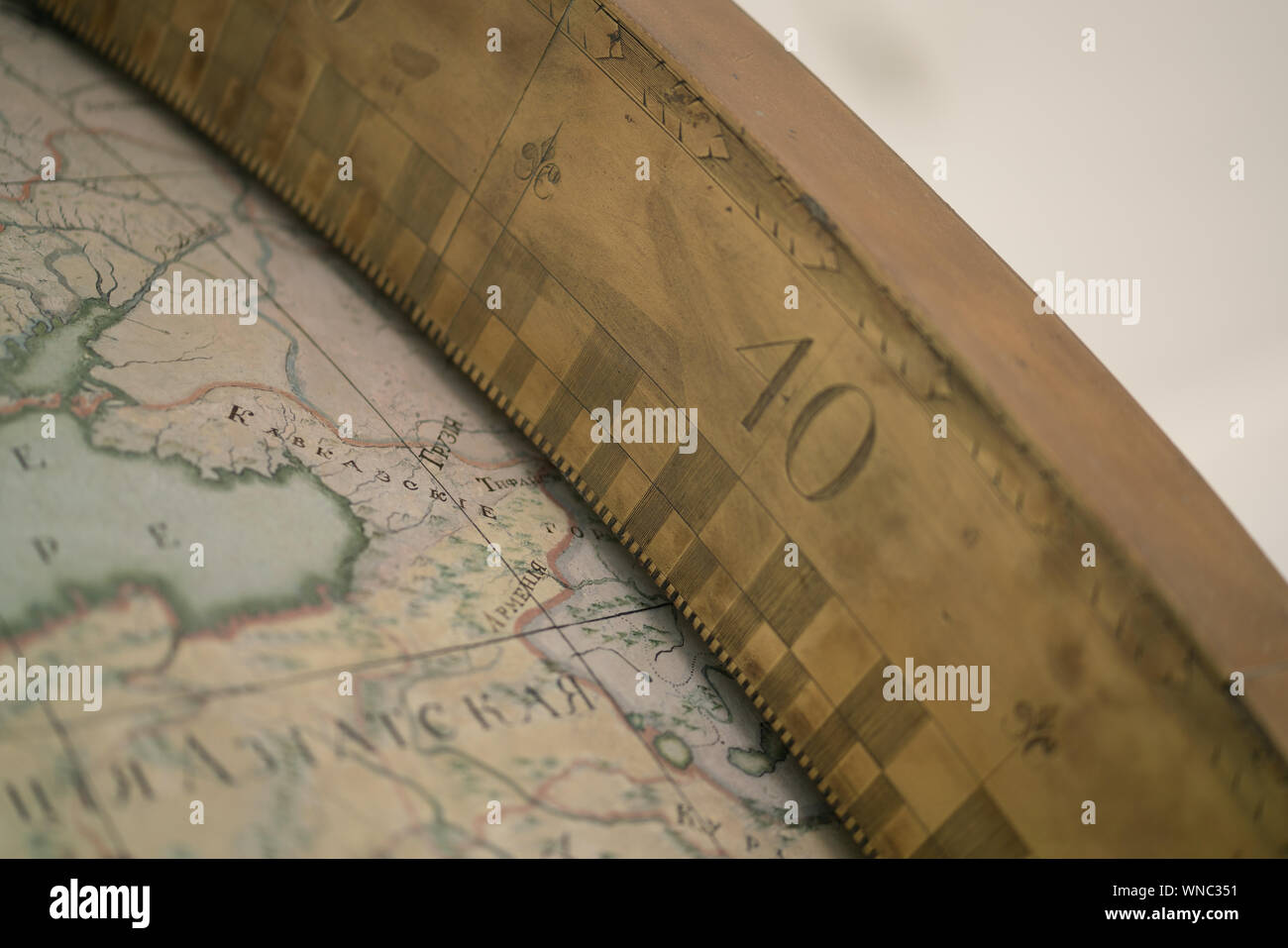 Studio close up of big round world retro globe with scale Stock Photo ...