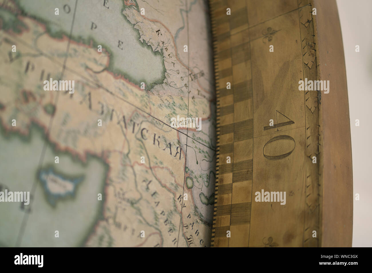 Studio close up of big round world retro globe with scale Stock Photo ...