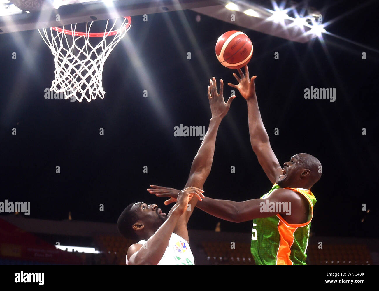 Guangzhou, China's Guangdong province. 6th Sep, 2019. Mohamed Kone (R ...