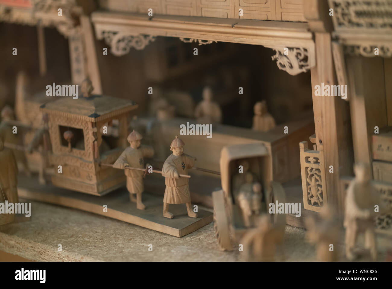 pretty cute detailed toy doll house with many figurines Stock Photo - Alamy