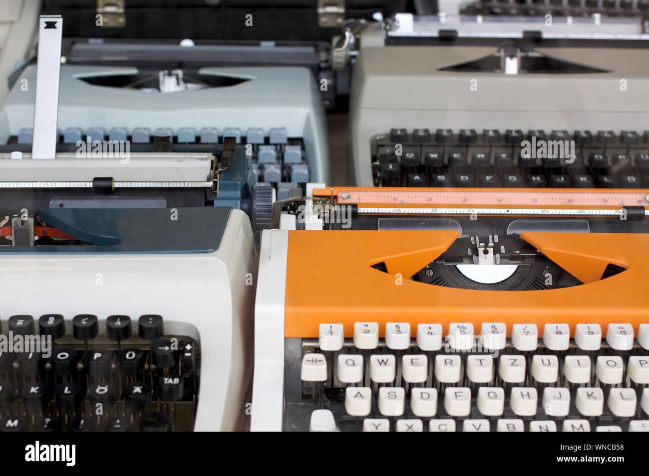 Retro row of typewriters hi-res stock photography and images - Alamy