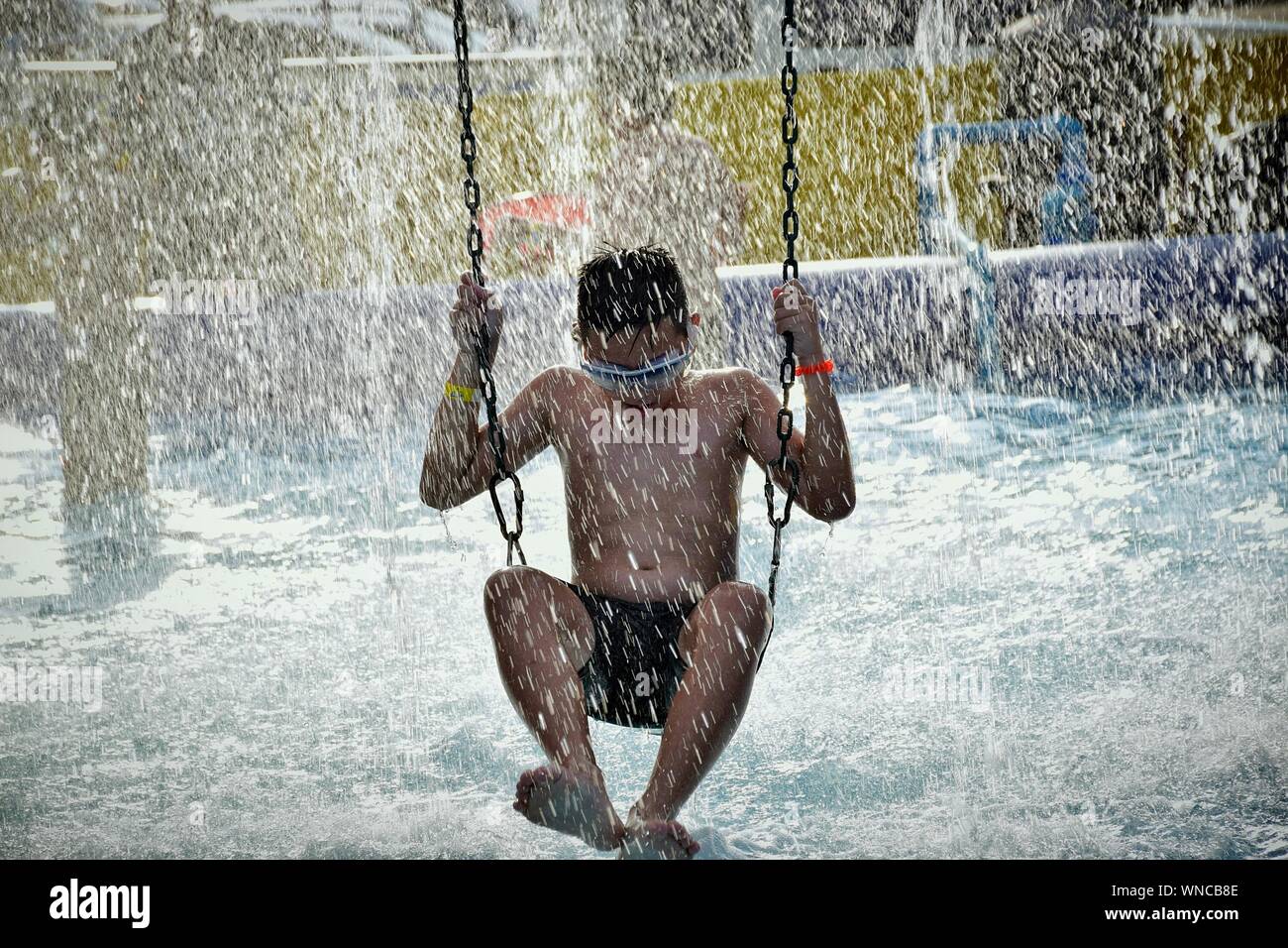 Swinging Over Water High Resolution Stock Photography and Images - Alamy