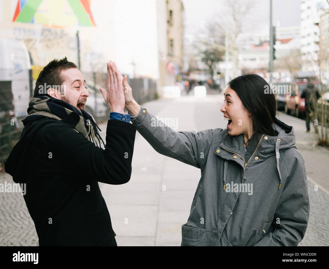 Two women giving high five hi-res stock photography and images - Alamy