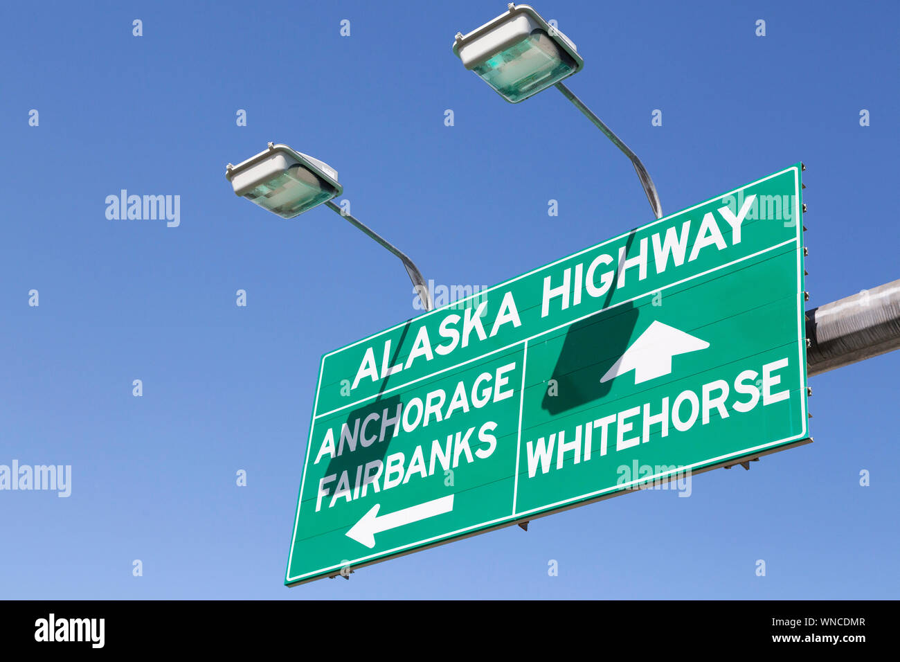 Road sign on the Alaska Highway at Haines Junction in the Yukon, Canada ...