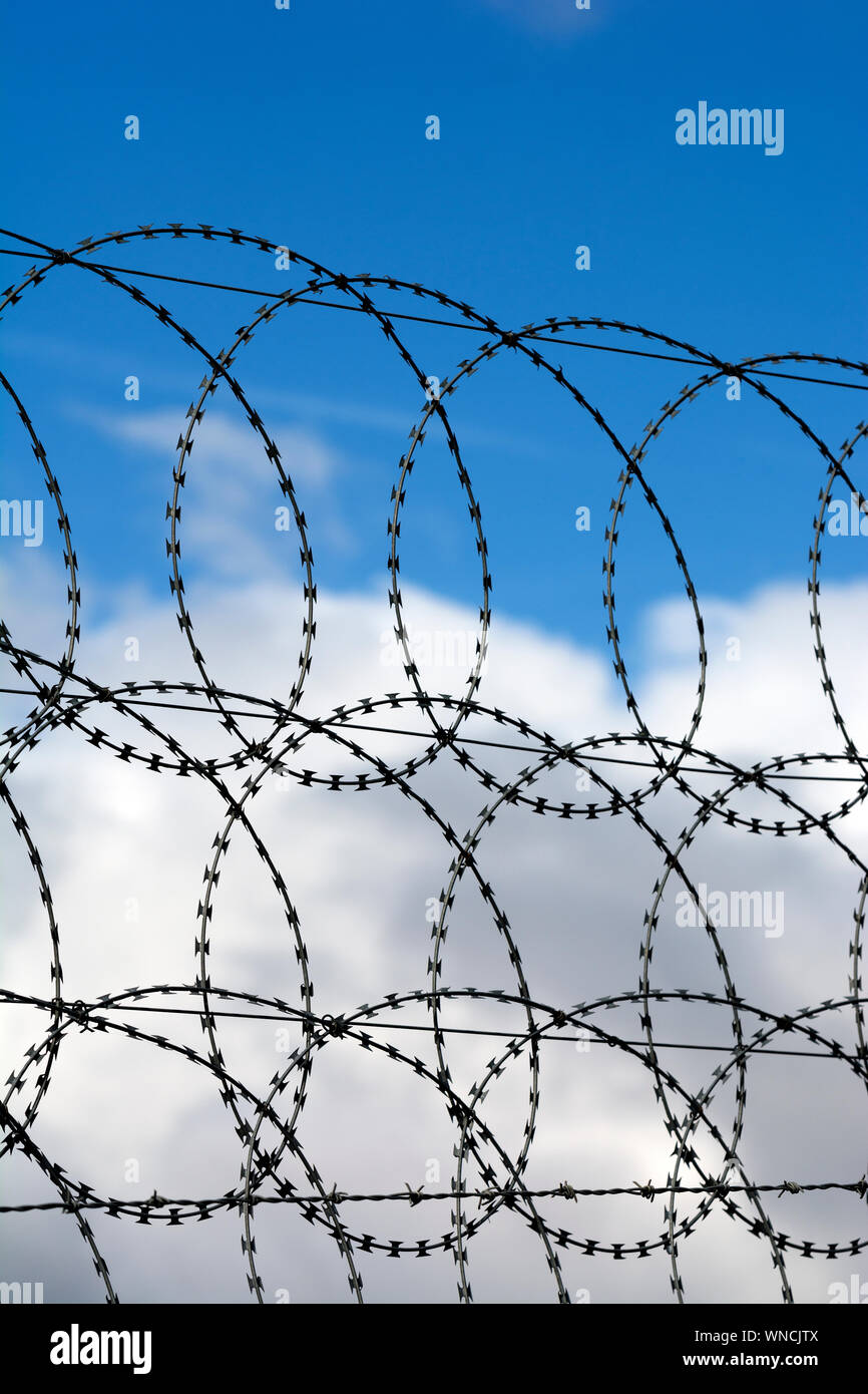 Razor wire fence hi-res stock photography and images - Alamy