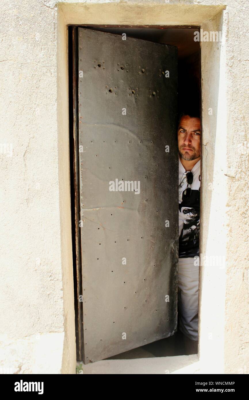 Peeking Through Door High Resolution Stock Photography and Images - Alamy