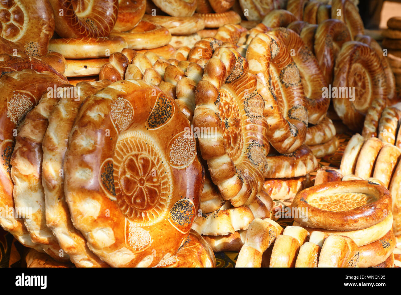 Traditional bread in Central Asia tandyrnaya pellet sold in the market ...