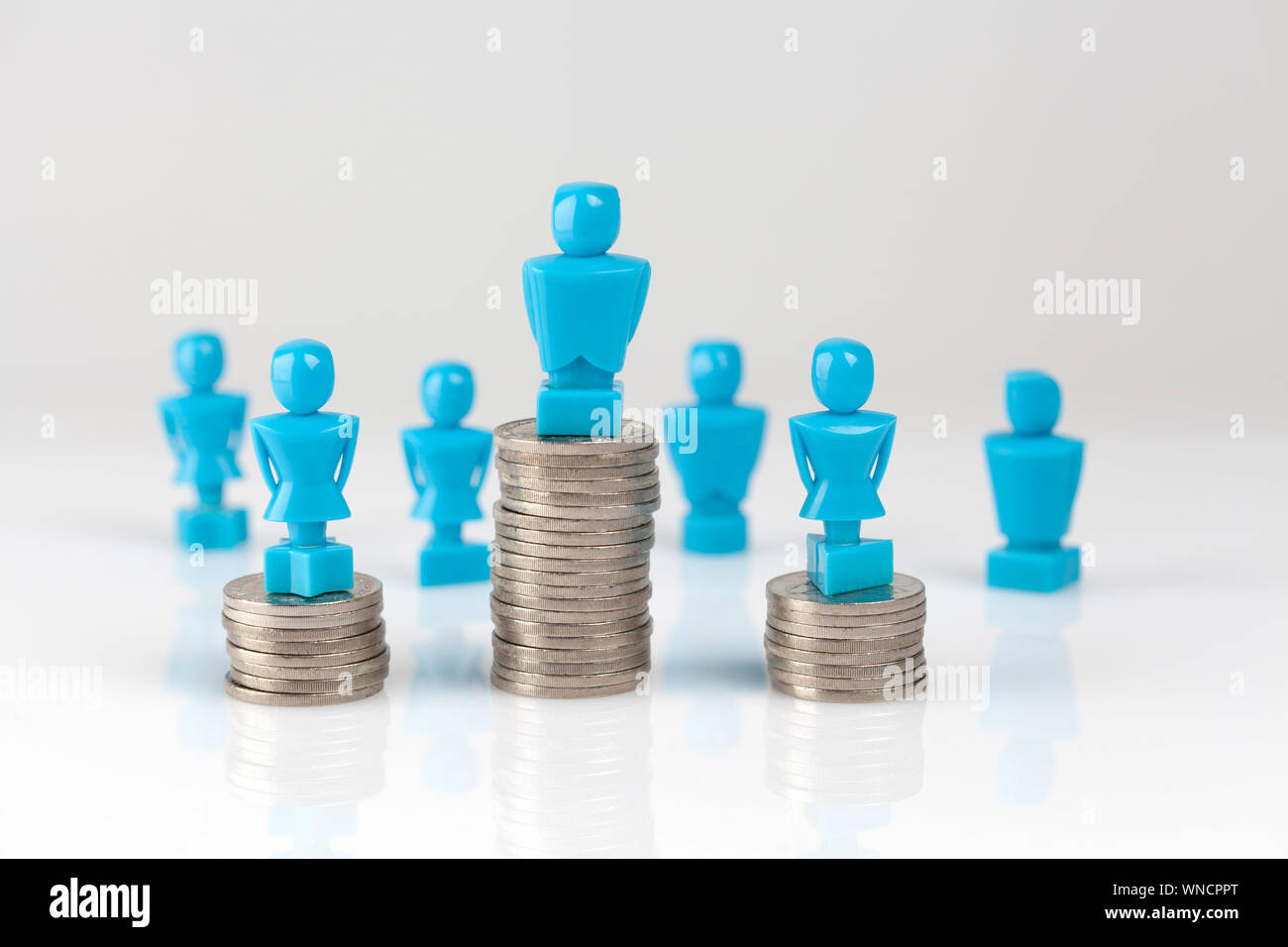 Money stack figurines hi-res stock photography and images - Alamy