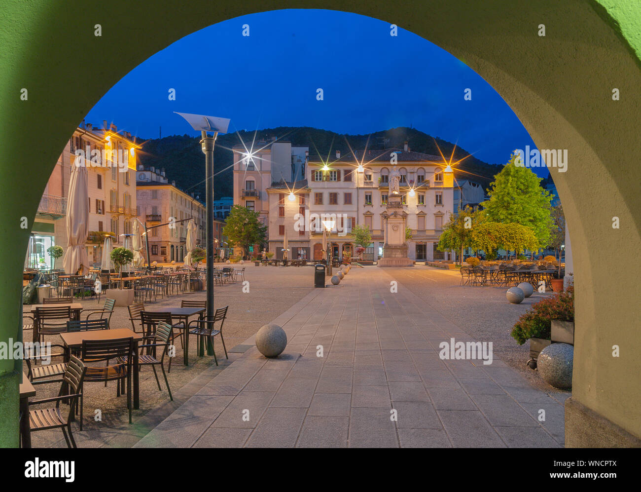 Como - The square Piazza Alessandro Volta and square at dusk Stock ...